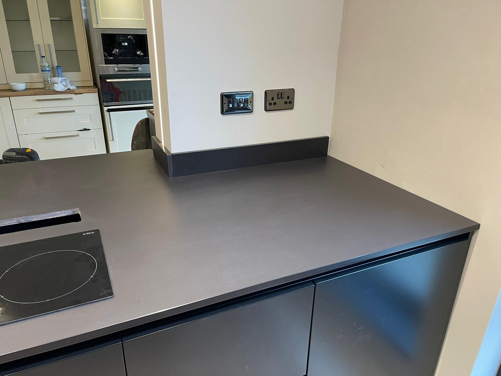 Dekton Domoos Plain Graphite Black Porcelain | Purple – purplegranite